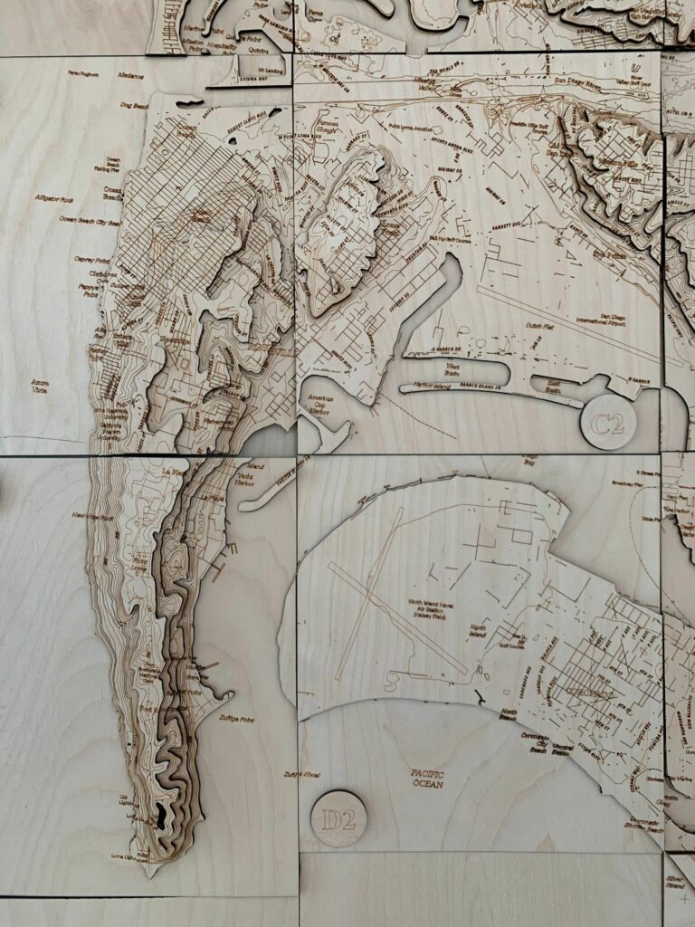 Close-up Section of Wooden Multidimensional Map - Changing The Subject